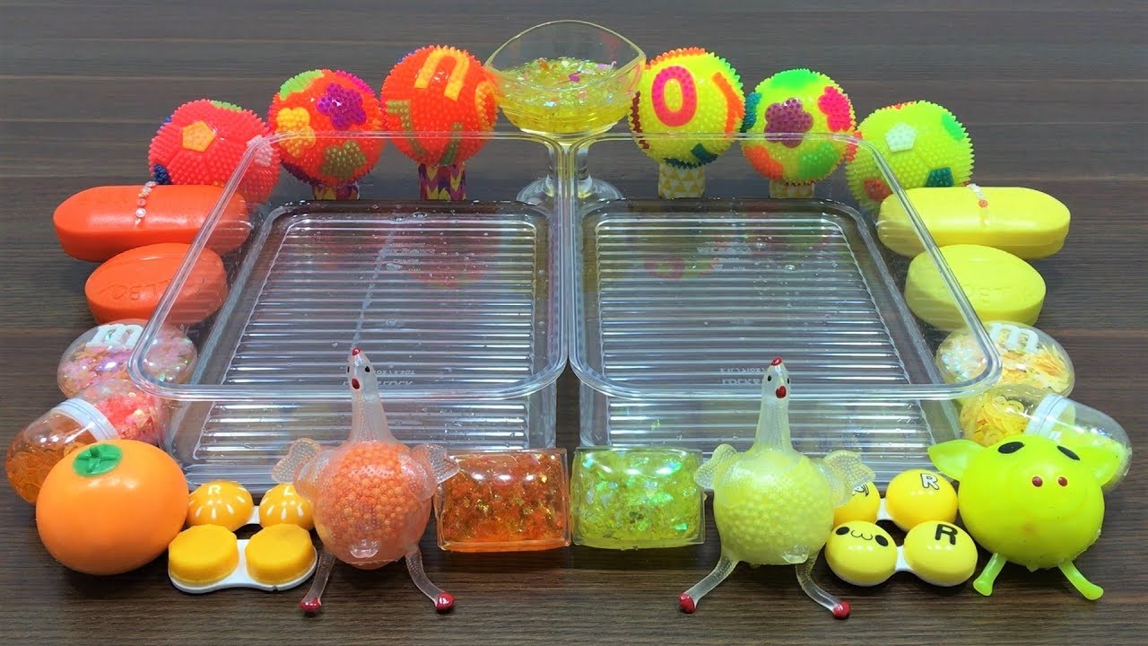 Mixing Floam and Glitter Into Clear Slime ! Orange vs Yellow Special ...