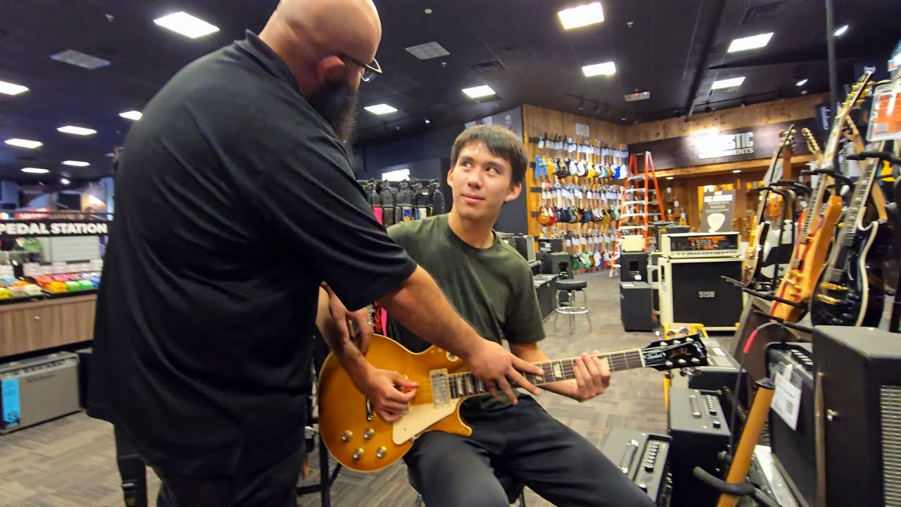 Playing Forbidden Riffs in Guitar Center - YouTube
