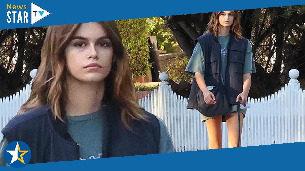 Kaia Gerber showcases her toned legs in an oversized shirt as she takes ...