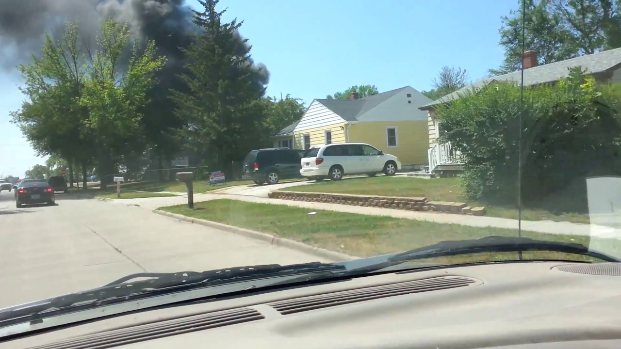 Vehicle on fire in driveway. - YouTube