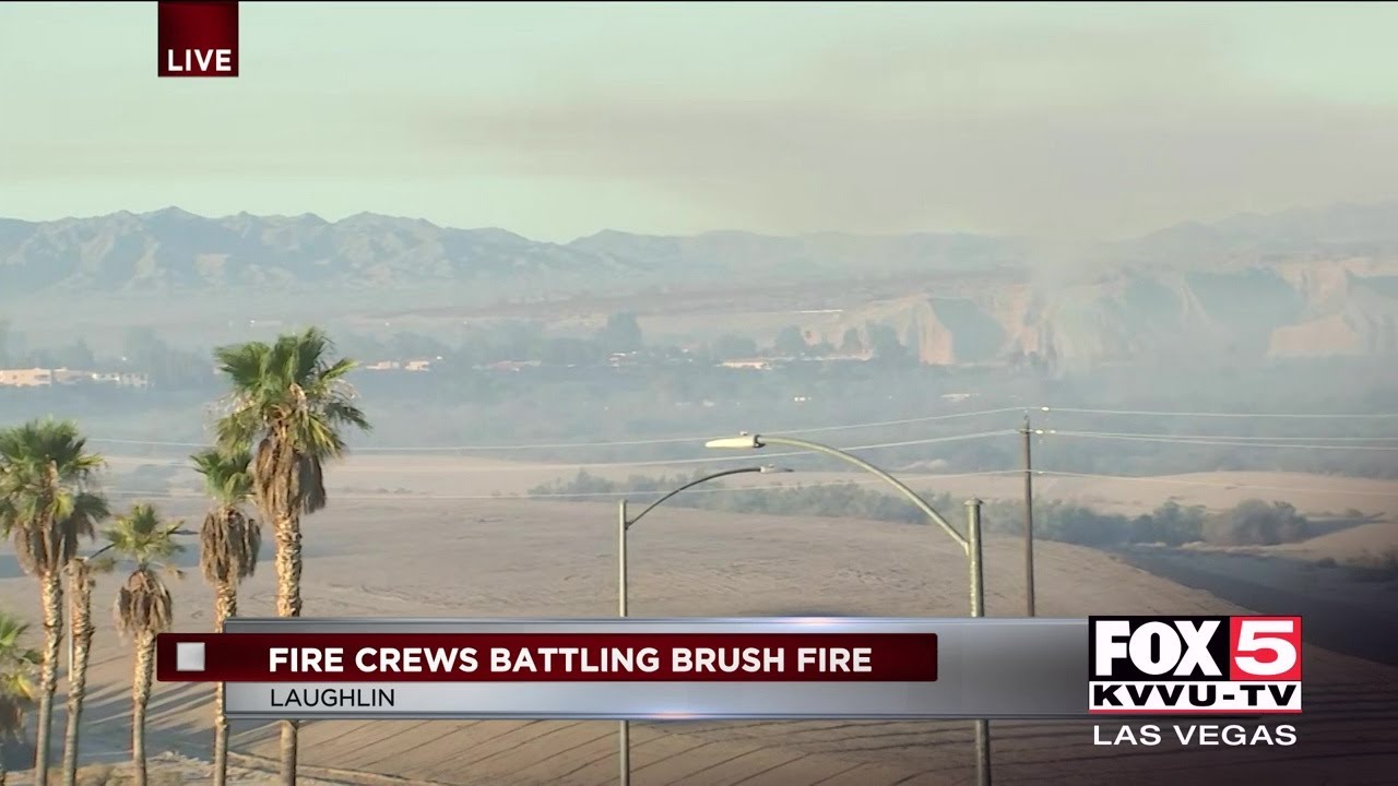 Crews continue to battle brush fire in Laughlin - YouTube