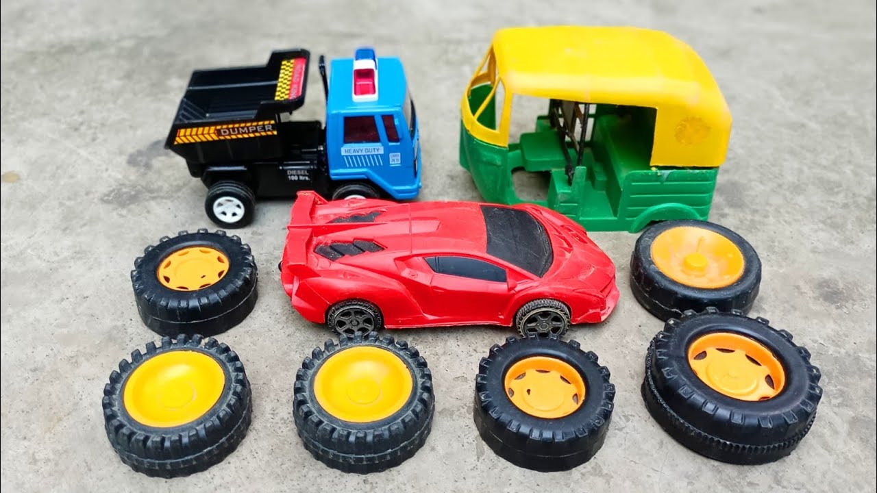 On the tree auto rickshaw, scooter, tata mini truck, mini tractor jcb ...