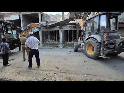 Demolition of Shops in Sankoo Market - YouTube