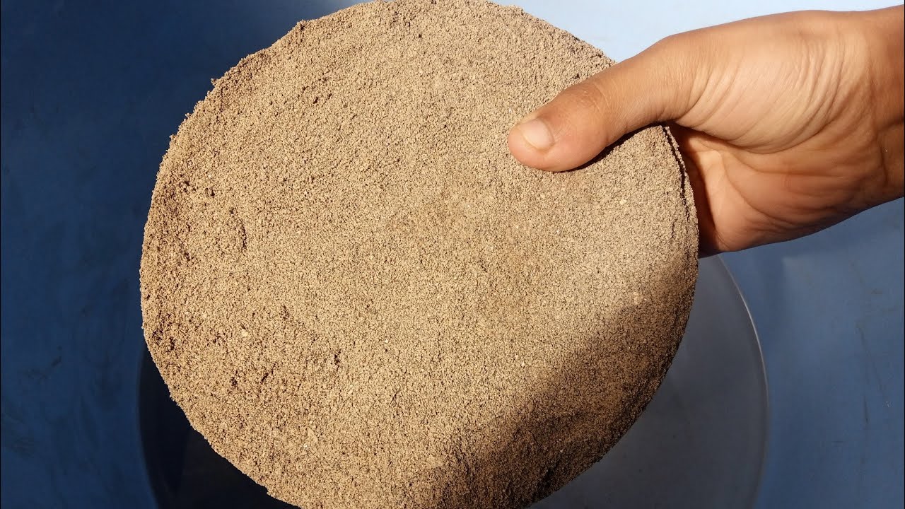 big sand plates crumbling in water - YouTube