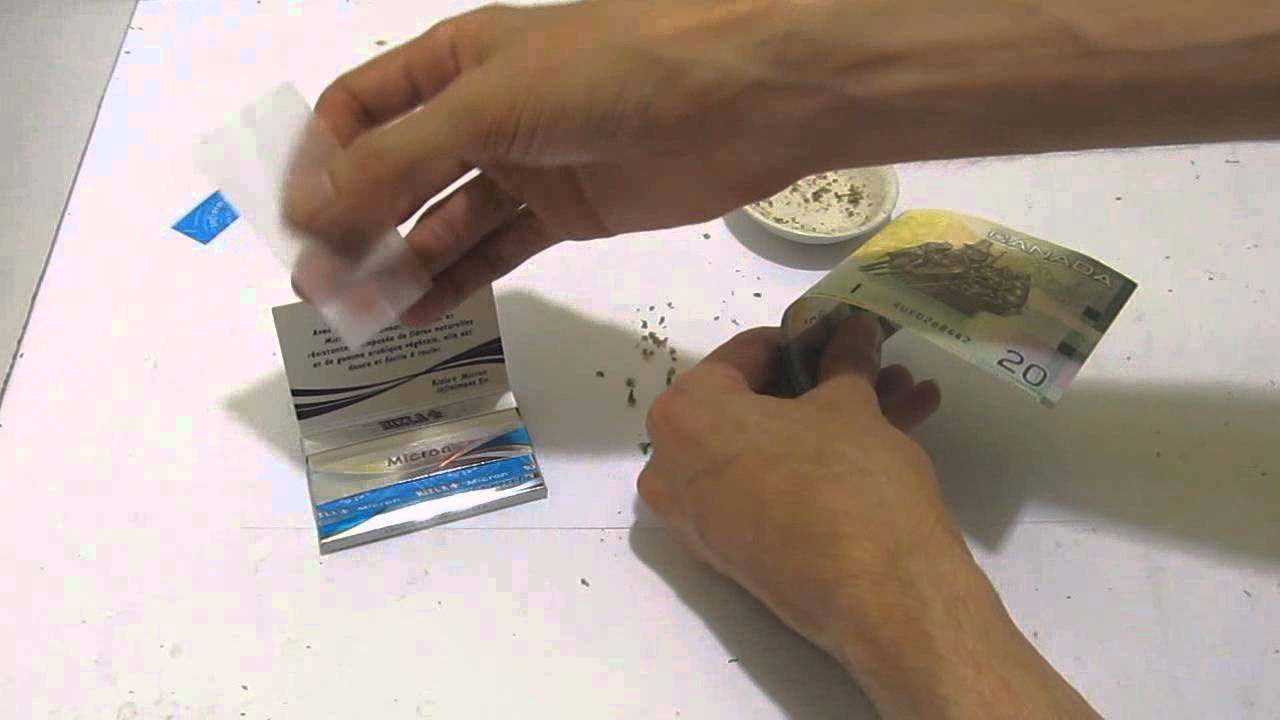 How to roll a joint with MONEY! Using a bill as a rolling machine - YouTube