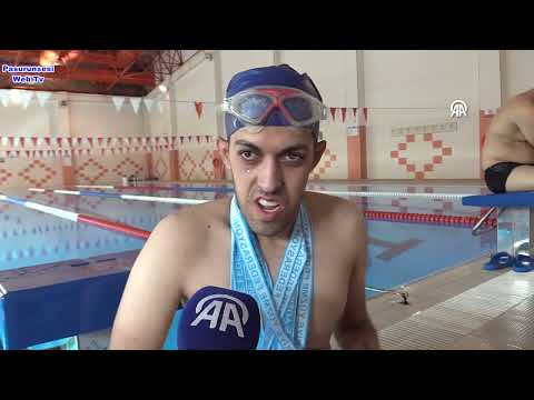 Birbirlerinden güç alan iki engelli sporcu madalyaya doymuyor