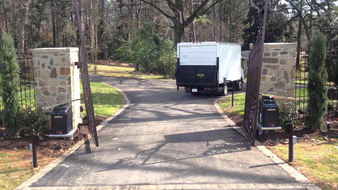 Uphill Swing Gates with LiftMaster CSW24VDCs - View from Inside - YouTube