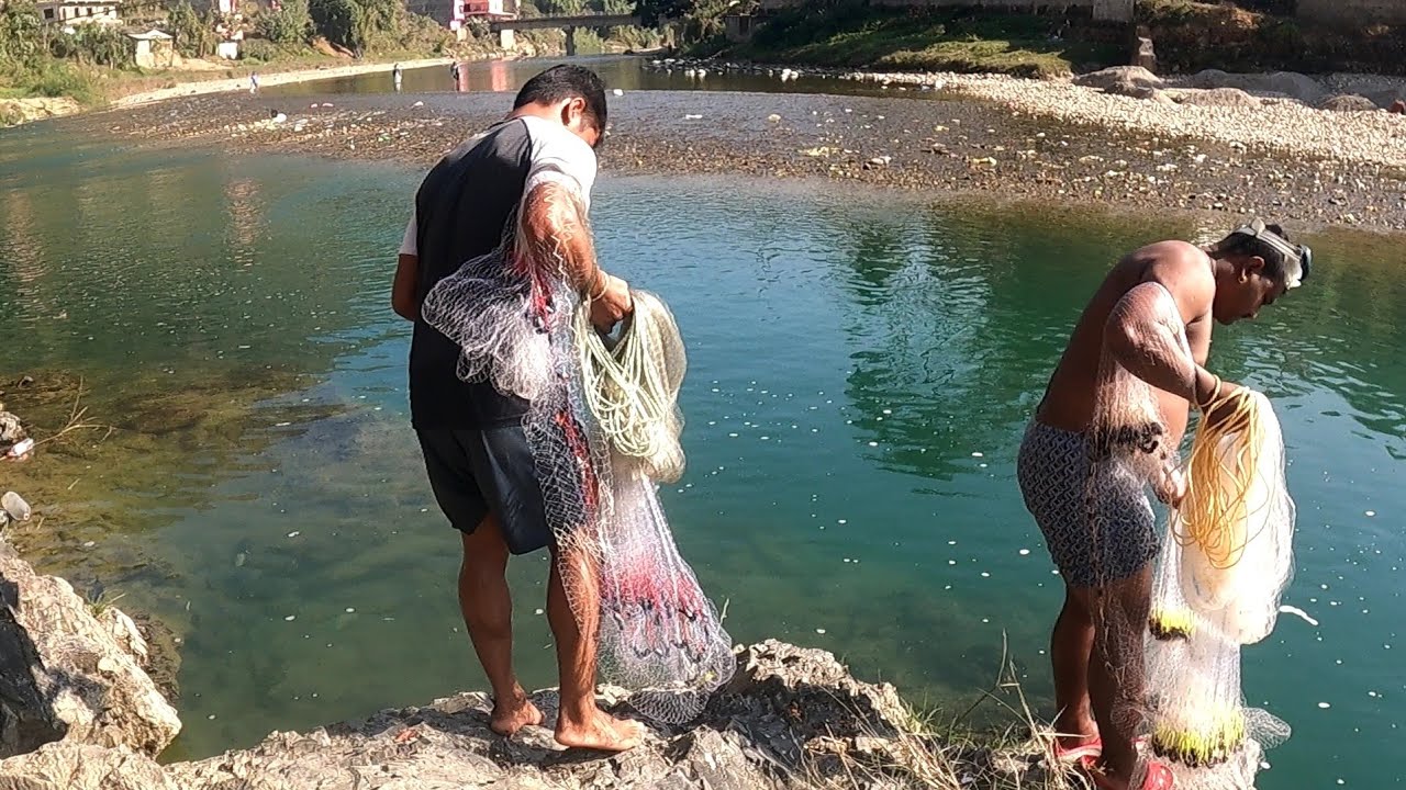 Best net fishing - Traditional Cast Net Fishing in aadhikhola river ...