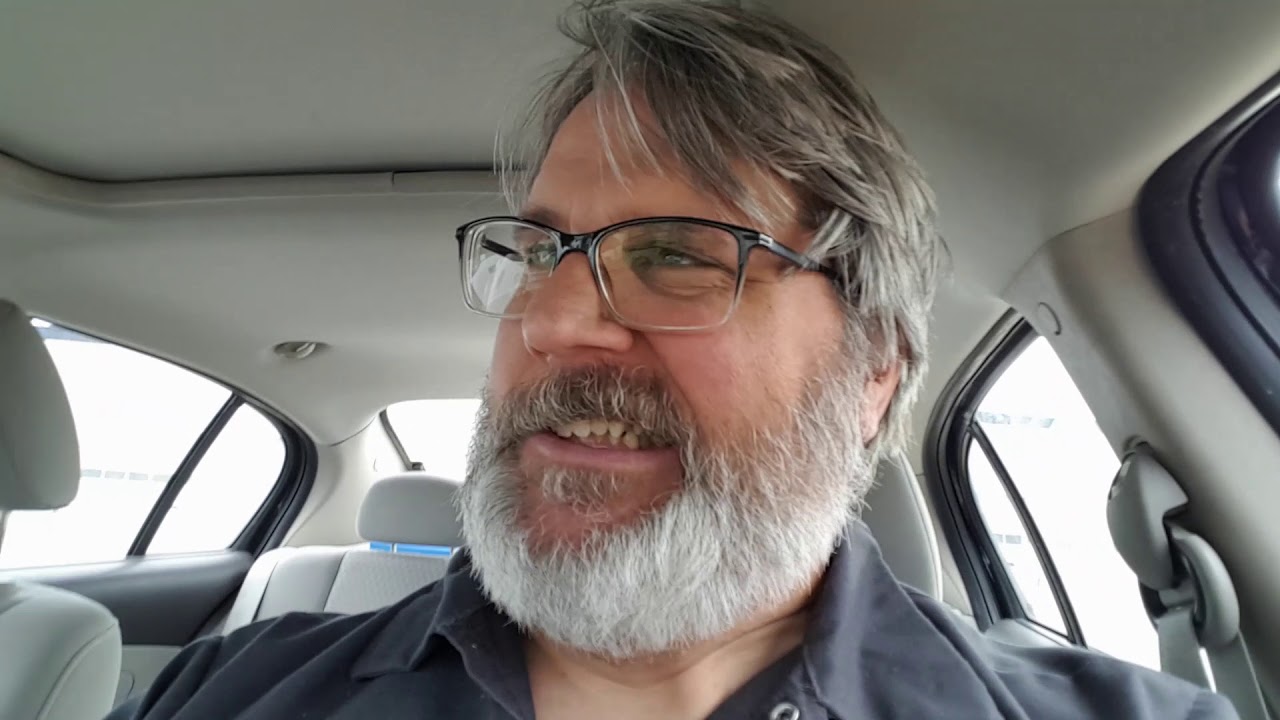 Old man rocking out in car. - YouTube