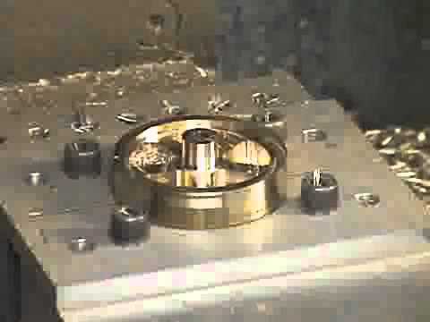 Spoked flywheel machining - YouTube