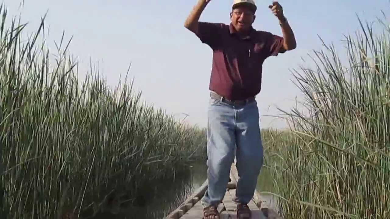 singing traditional song inside the Iraq Central Marsh - YouTube