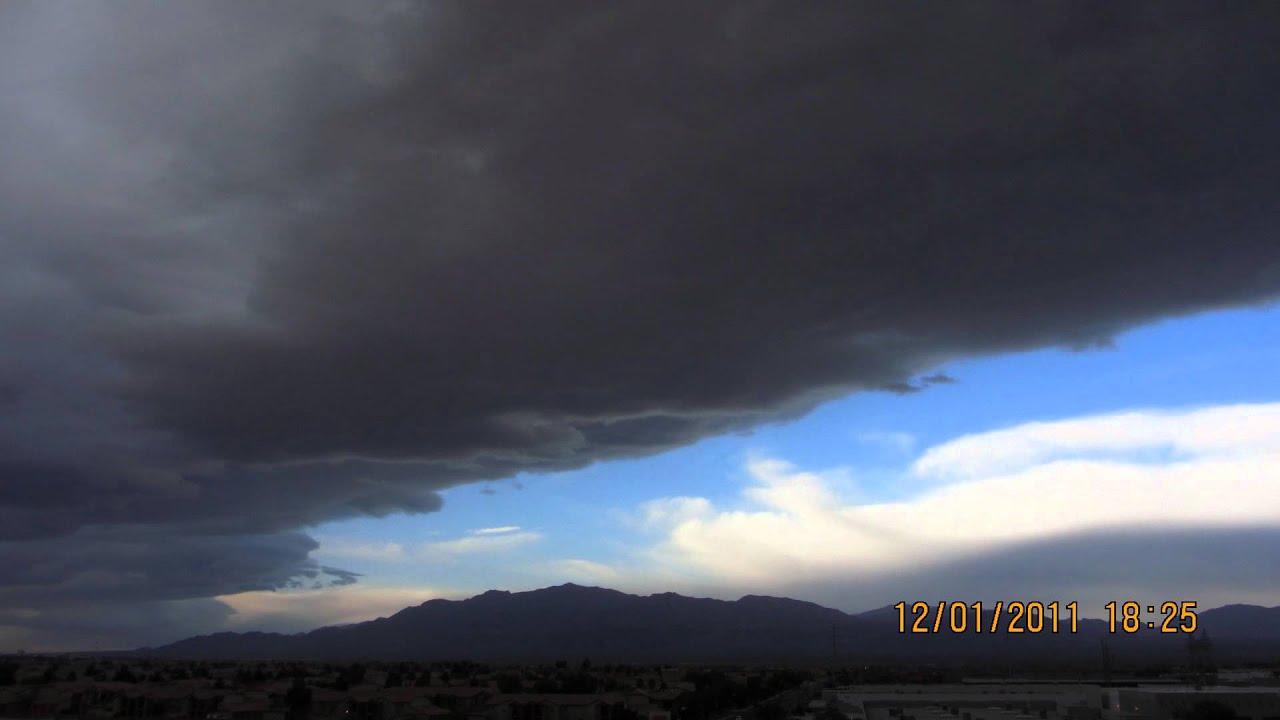 Time lapse: dark clouds forming over a mountain - YouTube