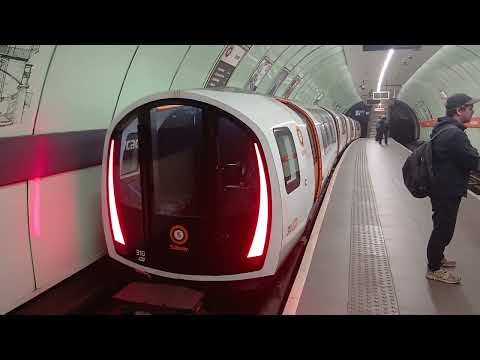 Stadler Unit 310 Departing Cowcaddens Underground Station Glasgow Scotland UK. 