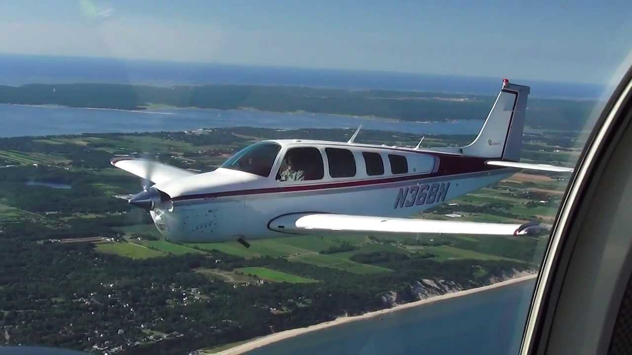 Bonanza flying in formation - YouTube