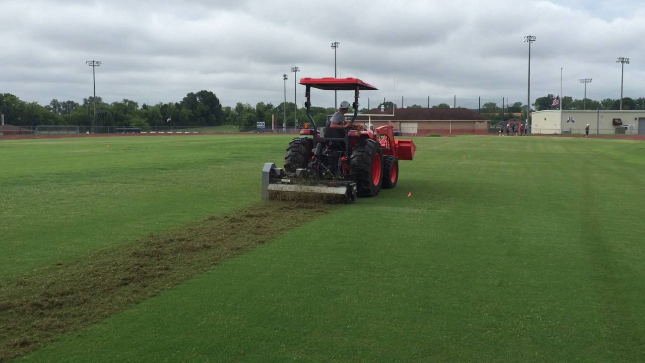 Kubota Tractor + Verticutter Attachment - YouTube