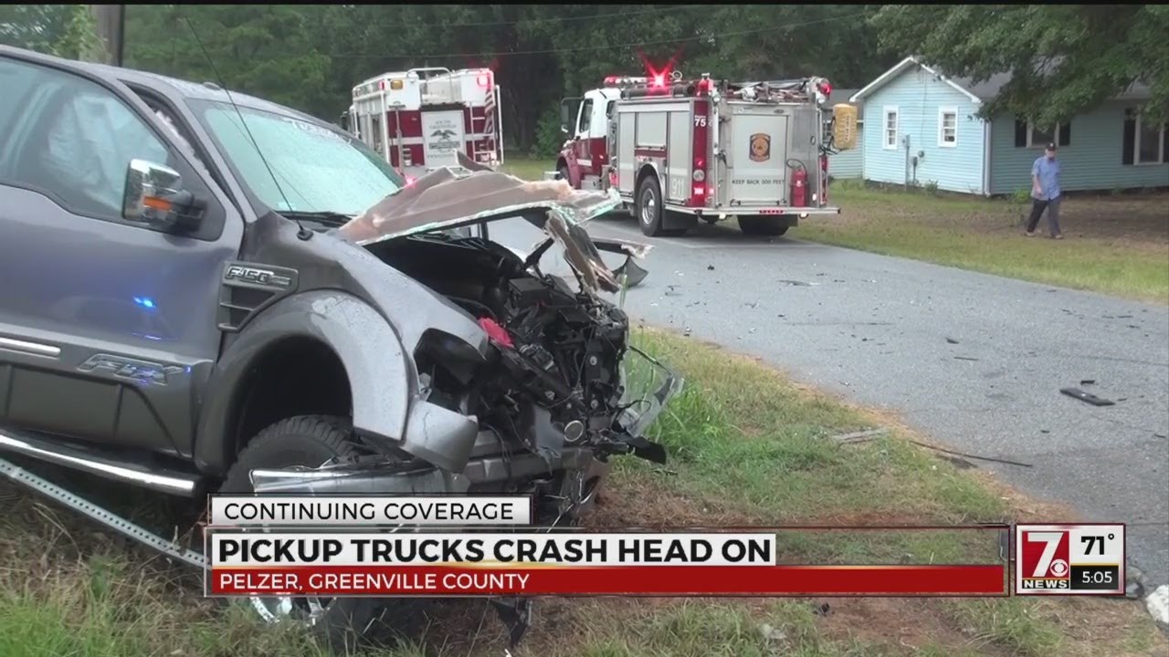 Pickup trucks crash head on - YouTube