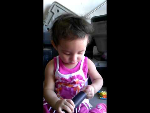 Baby playing with vacuum, lol!