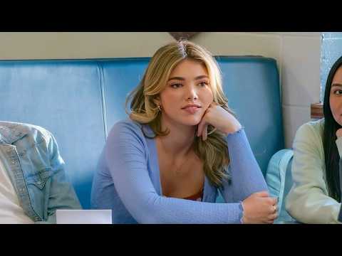 She has to live in a house with 8 teen boys and falls in love with two of them