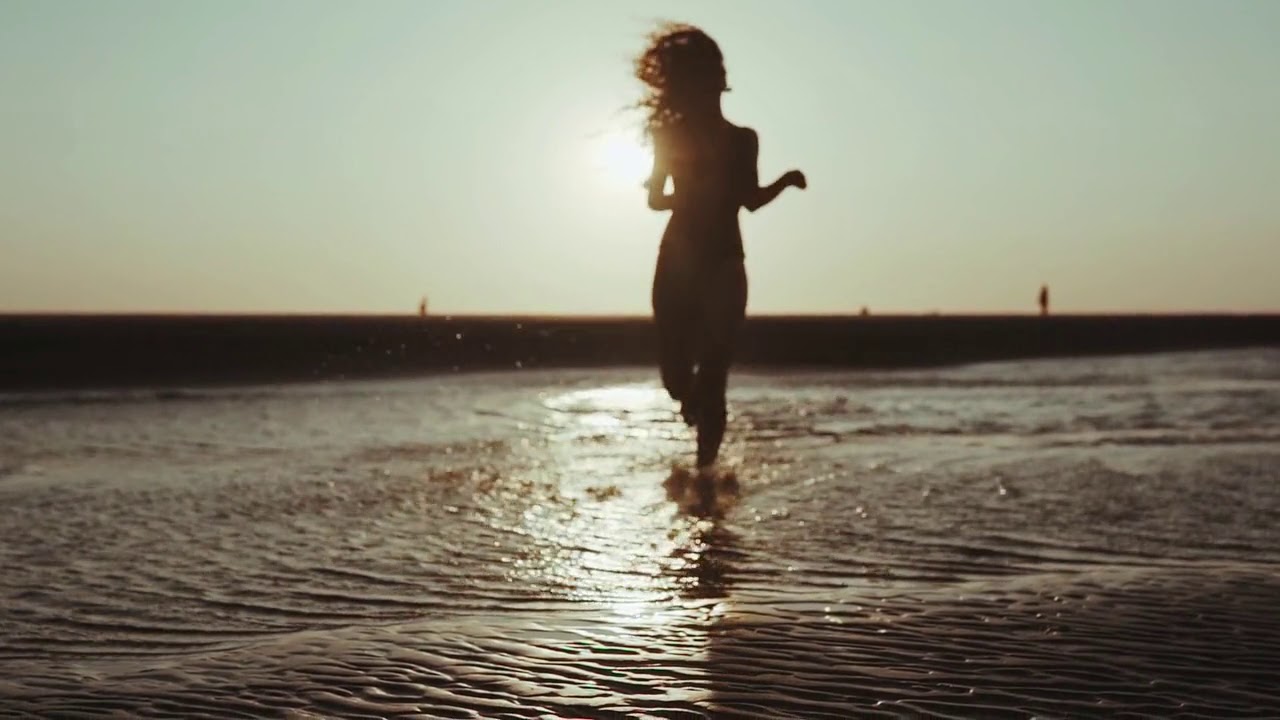 Women running with water - YouTube