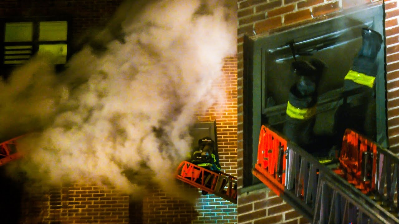 **FIREMAN DIVES THRU WINDOW!** FDNY Battles ALL-HANDS HI-RISE Fire ...