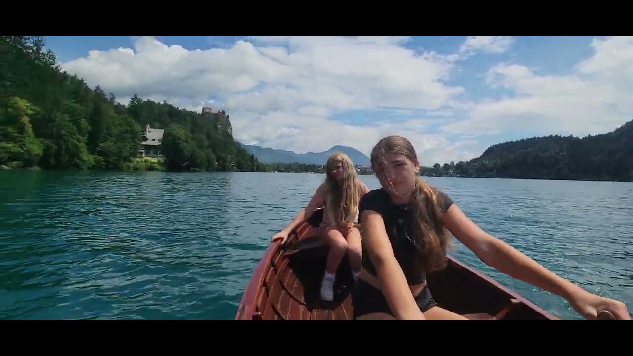 Grumpy teen rowing on Lake bled - YouTube