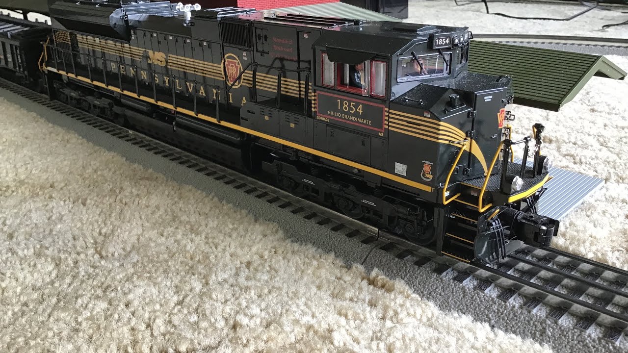 Running my o scale NS PRR heritage sd70ace - YouTube