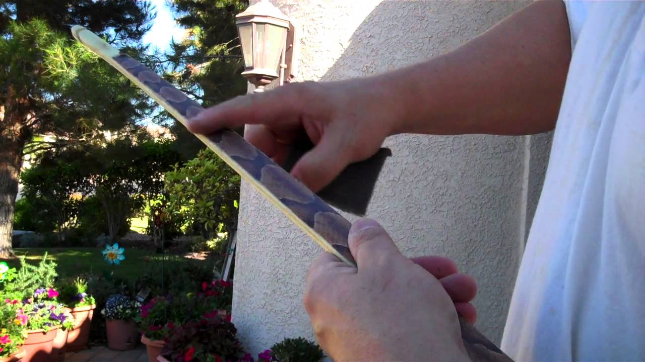 How to back a bow with snake skins, Part 4 - YouTube