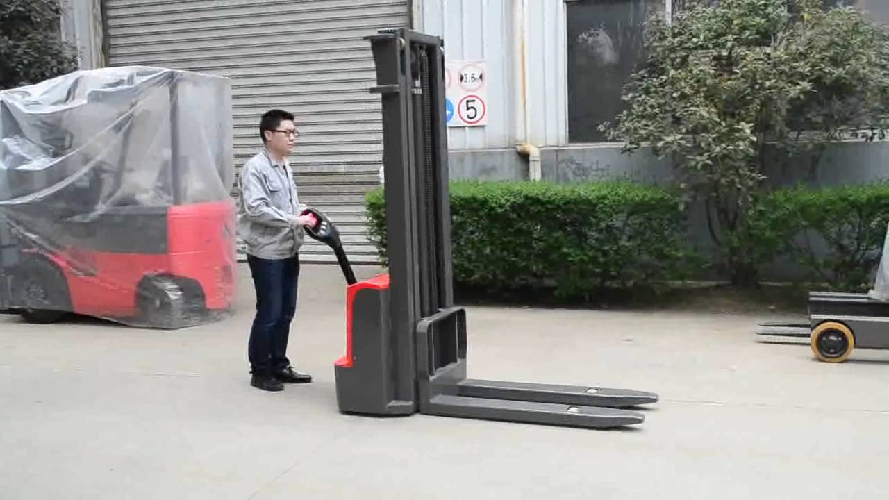 TBD 1000kg mini narrow walkie electric pallet stacker - YouTube