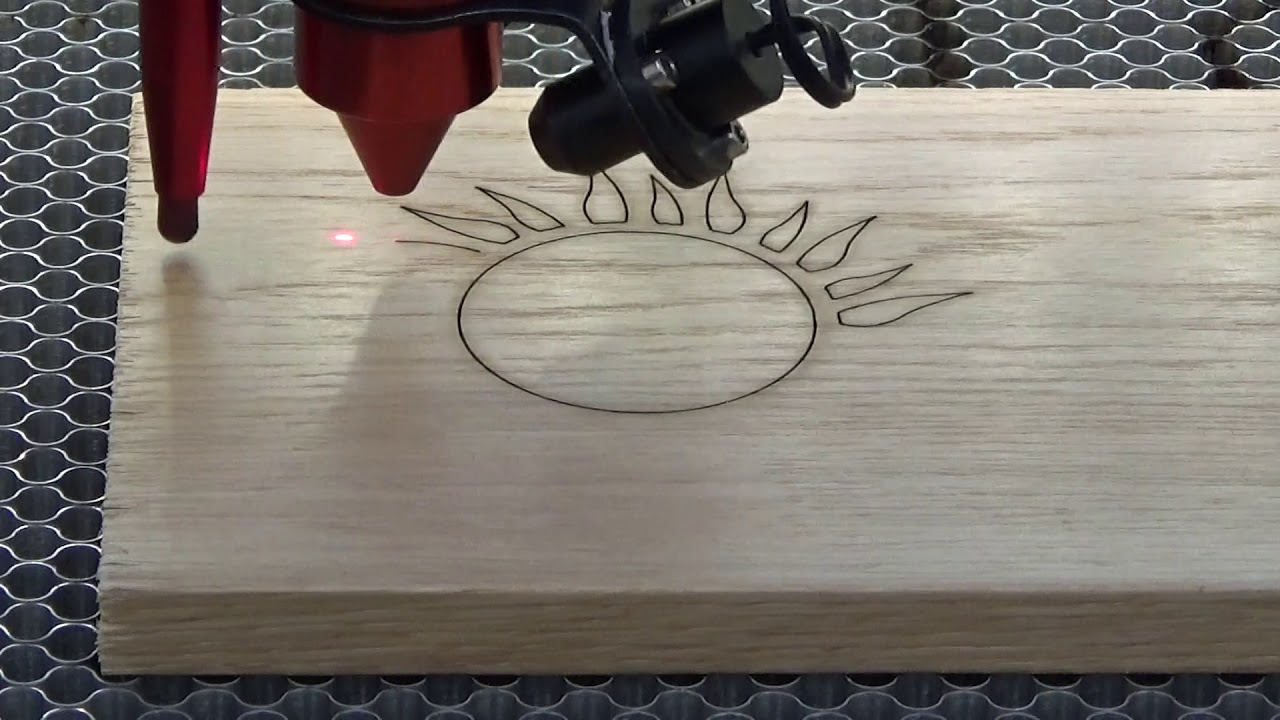 Laser engraving a sun shape - YouTube