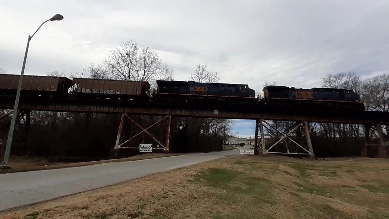 CSXT 7027 leads CSX E308 a cross the SCL trestle in Enoree SC - YouTube