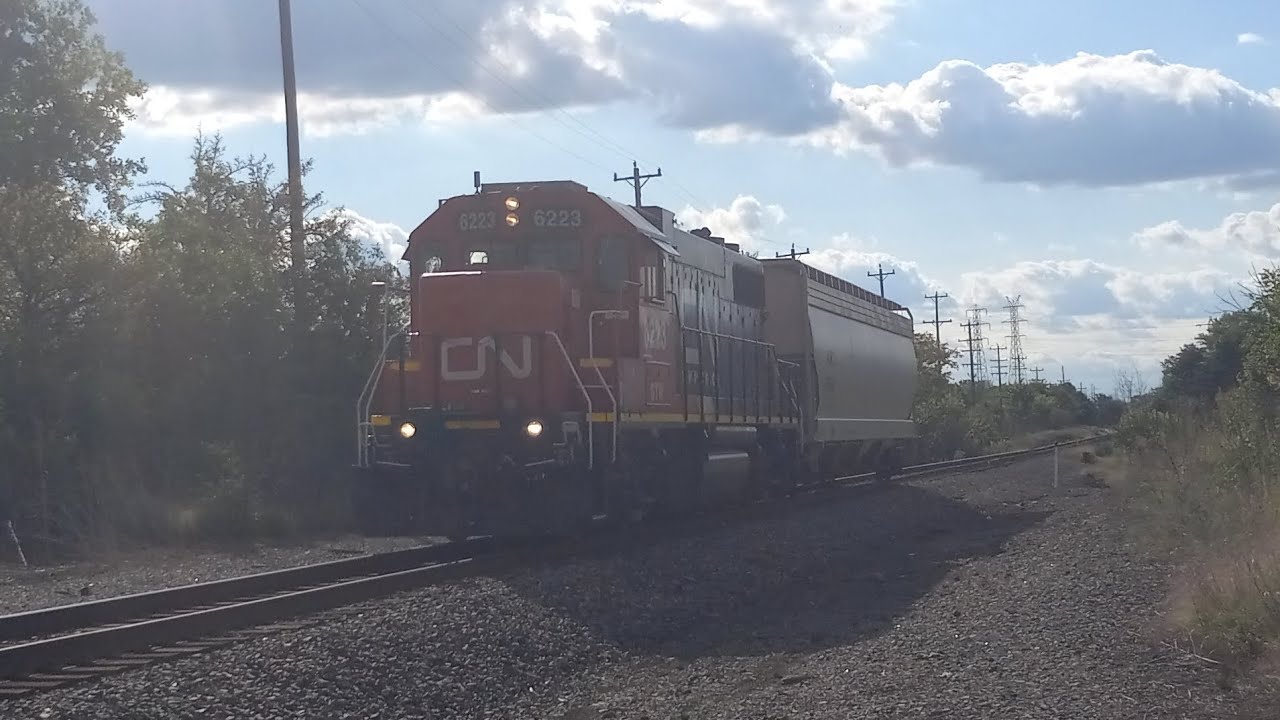 CN GP38-2 EX-GTW lead a ONE car train - YouTube