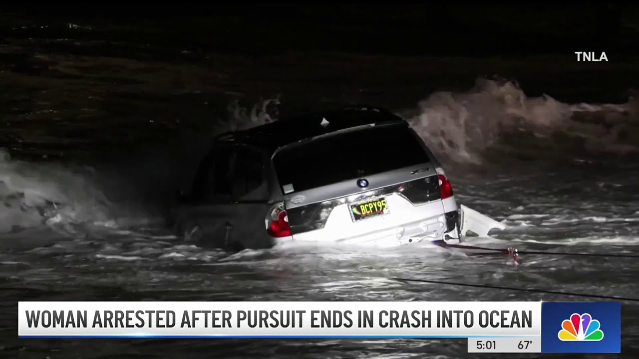 Woman arrested after driving car into ocean during pursuit - YouTube