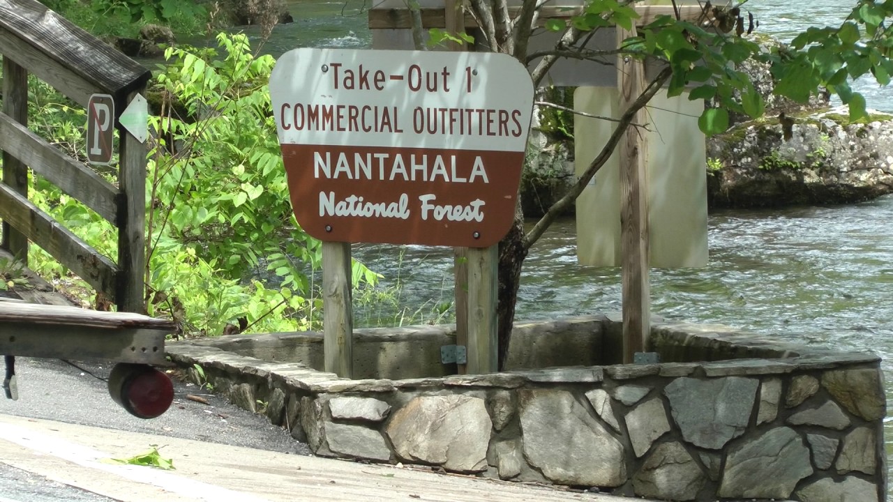 white water rafting raft "take out" location sign along Nantahala River ...