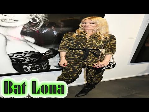 Claudia Schiffer, 47, wears wild leopard print jumpsuit in London