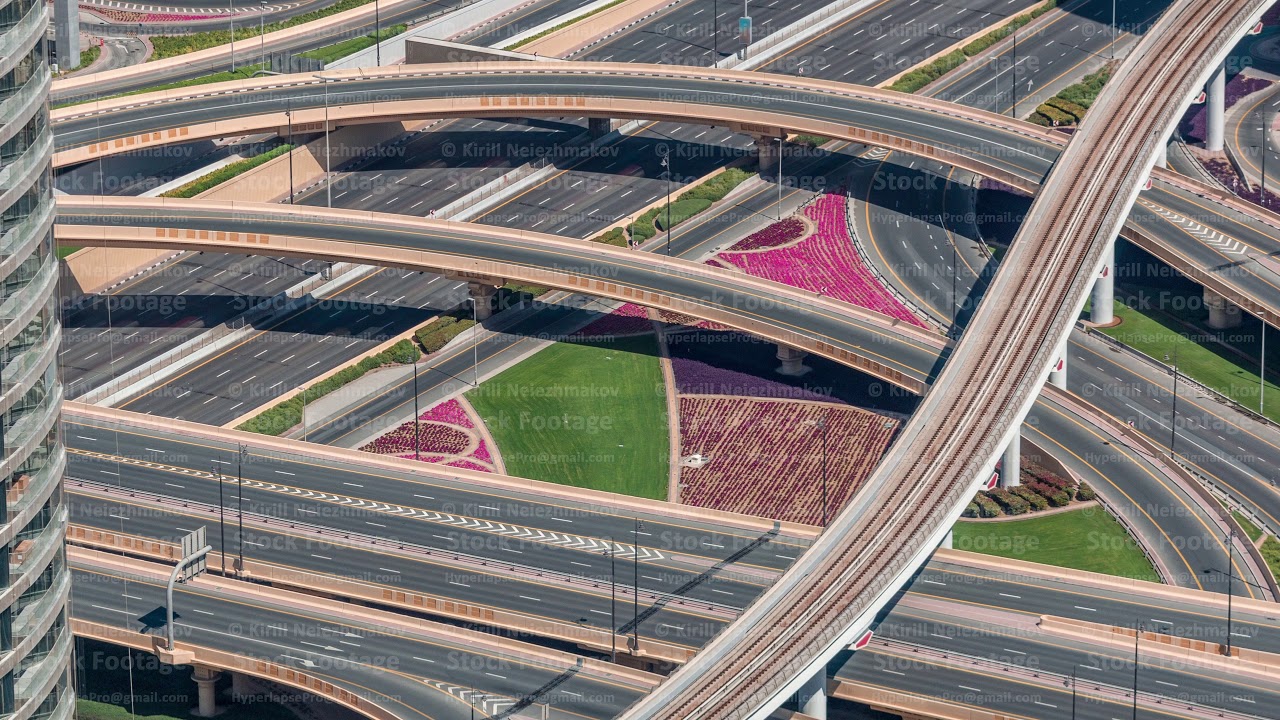 Aerial view of highway interchange in Dubai downtown timelapse. - YouTube