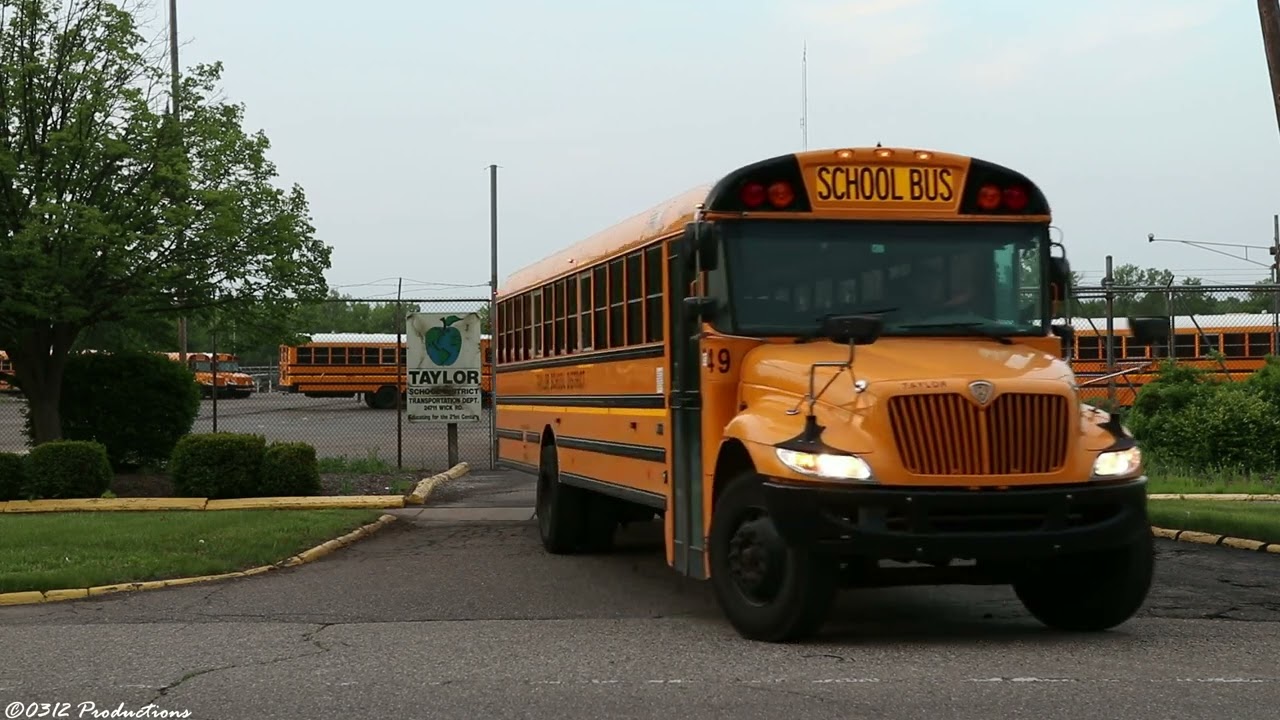 Taylor School District Buses Leaving the Yard - YouTube