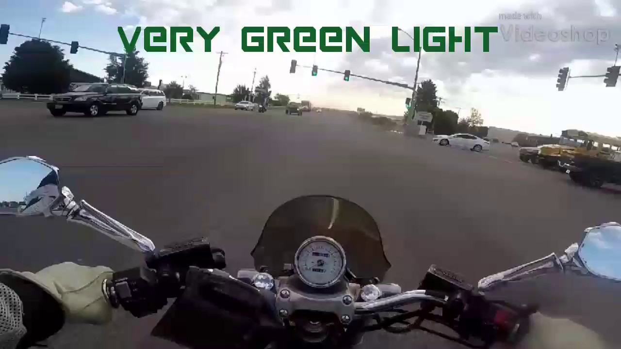 Driver cuts off motorcycle - YouTube