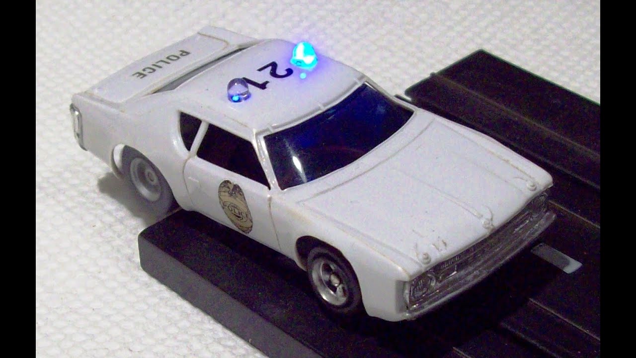 Custom Aurora AFX Matador Police Car with flashing LEDs - YouTube