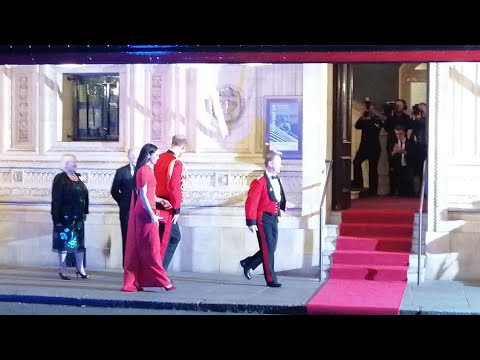 Duchess Meghan is a showstopper in a drop-dead gorgeous red dress ...