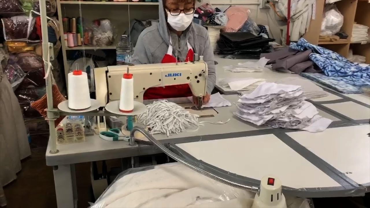 Luxury linen maker shifts overnight to face masks - YouTube