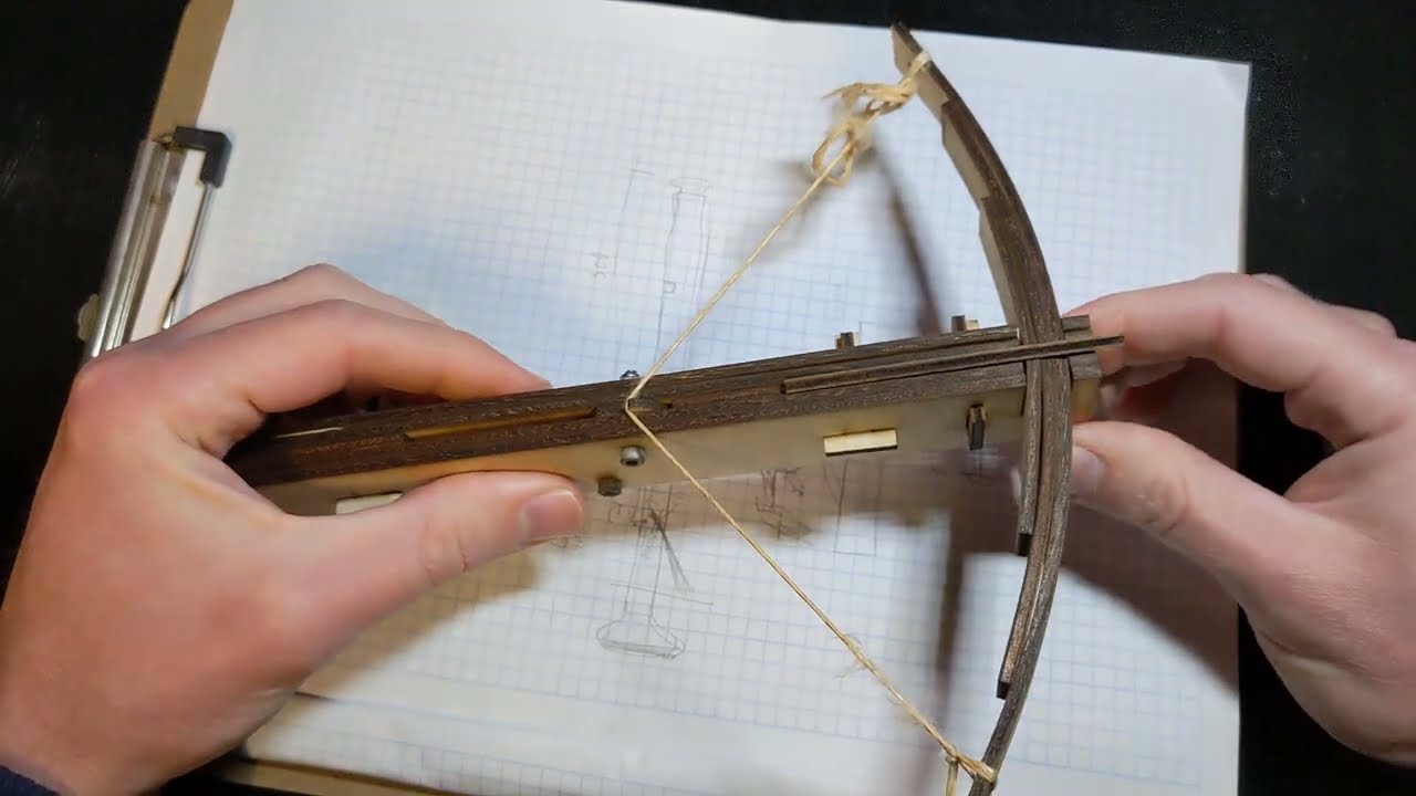 Laser cut toy crossbow - YouTube