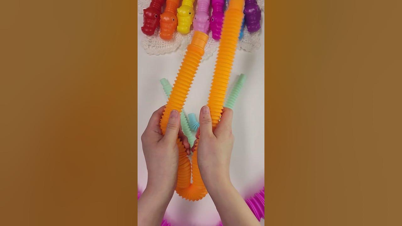 Stretching pop tube sounds fun! Blow stress with #poptubes in #colorful ...