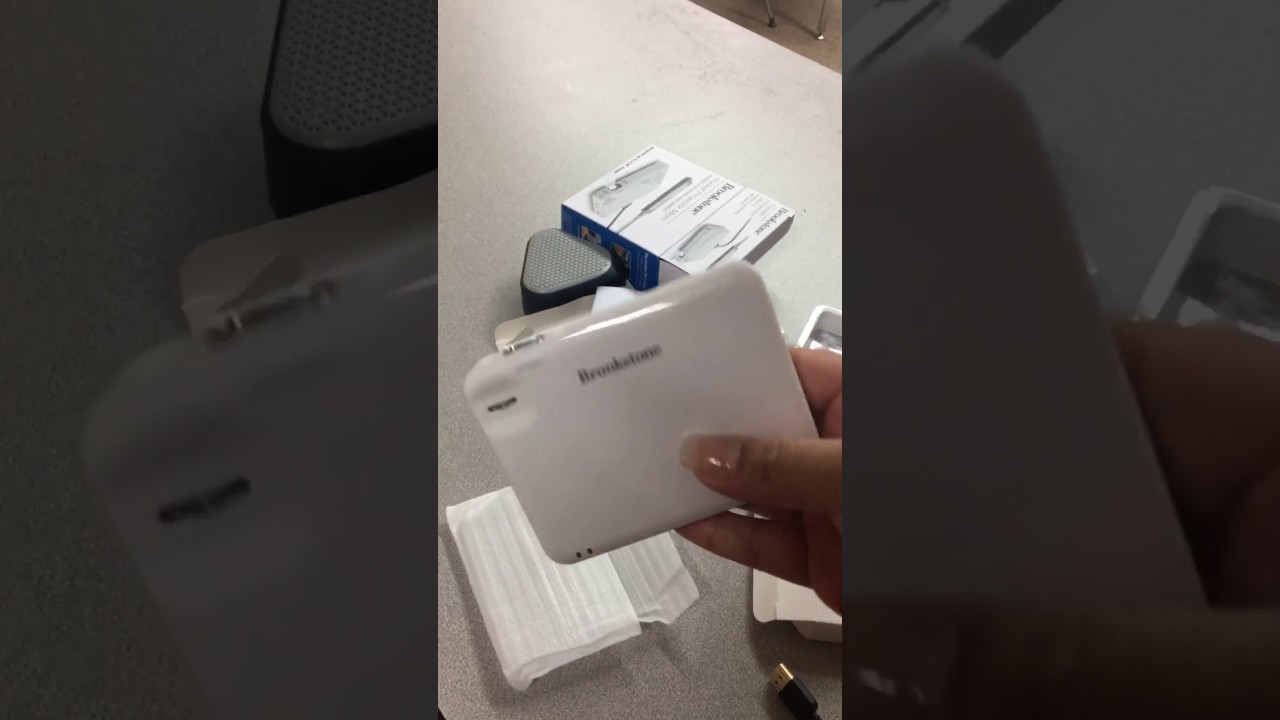 Brookstone pocket projector micro unboxing and review - YouTube