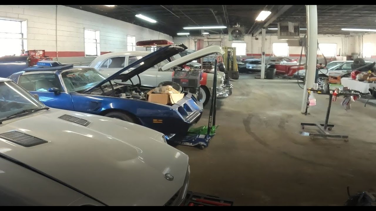 My buddy Connor's garage-1929 Model A, Datsuns, Carrera, Lotus and more ...