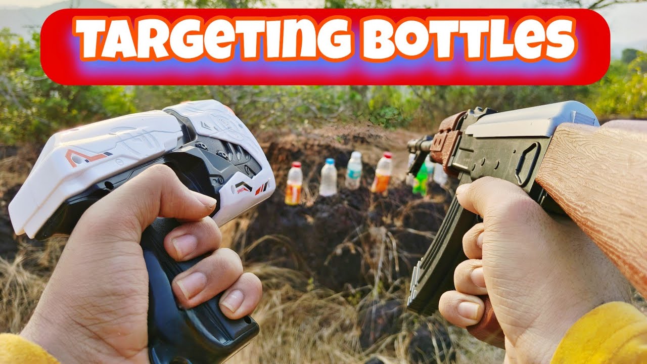 Shooting bottles from playing guns|Soft bullet gund and ak-47 - YouTube