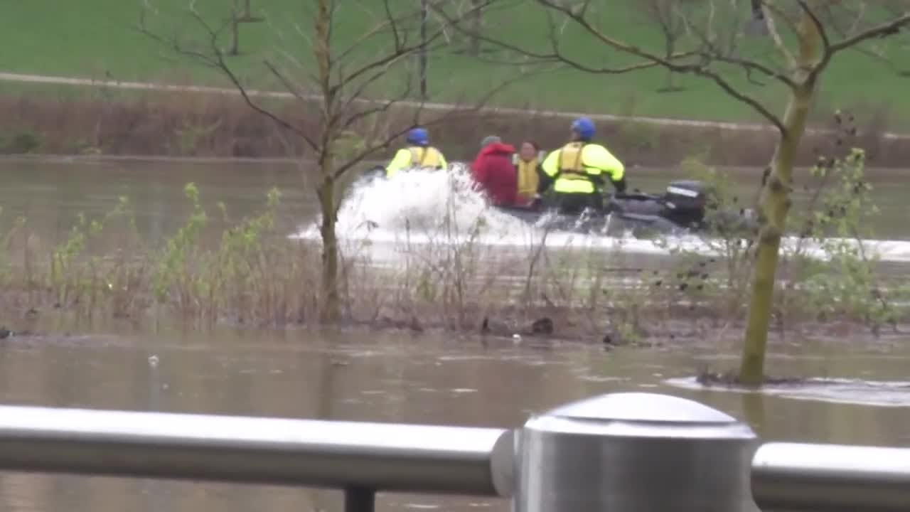 Firefighters rescue 2 people trapped under Ohio bridge by fast-rising ...