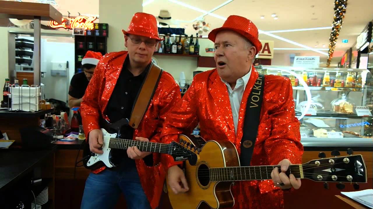 Das "Volker Frank Duo" singt "Feliz Navidad"! Acordes - Chordify