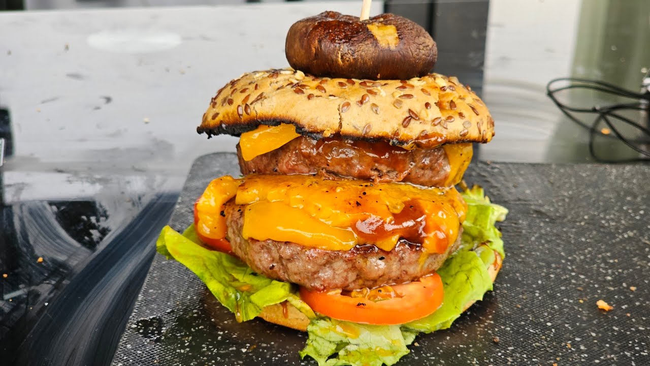 Black Angus Burger with Cheddar Cheese, Grilled Mushroom, and a Fiery ...