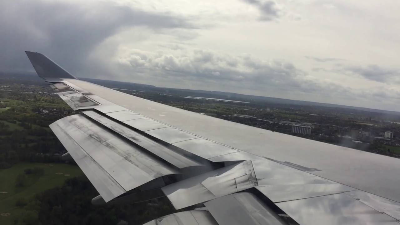 Very windy landing British Airways 747-400 from Miami with great wing ...