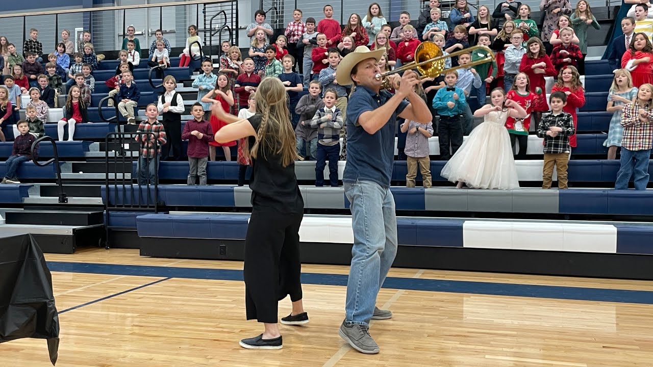 Farmer marches through kids Xmas concert - YouTube